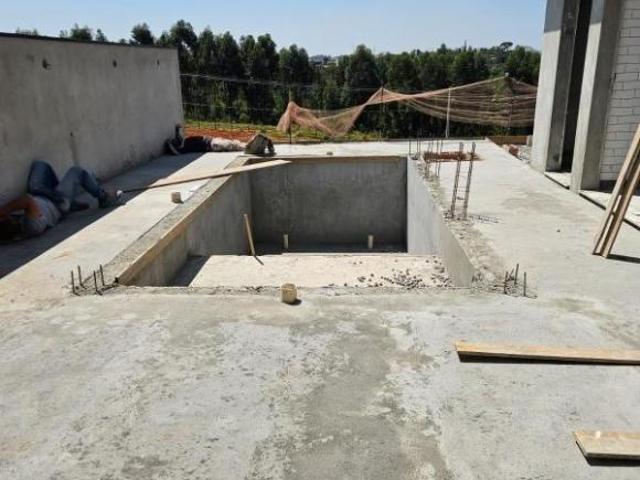 Casa térrea moderna com 195m², 3 suítes, piscina e área gourmet no Condomínio Ibiaran II em Itupeva/