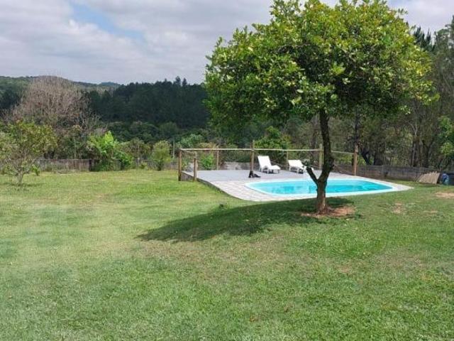 Casa Térrea Moderna com Área de Lazer Completa em Terreno de 1.568 m² – Campo Realengo | R$ 600.000