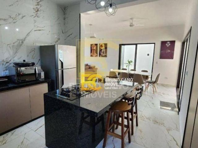 Casa térrea moderna com piscina em condomínio Residencial Jardim São Luís Peruíbe/SP