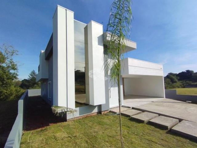 Casa térrea moderna com suíte e varanda gourmet no Terra Madre
