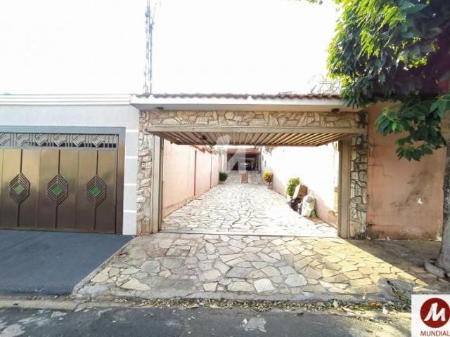 Casa térrea na rua 4 dormitórios, cozinha planejada