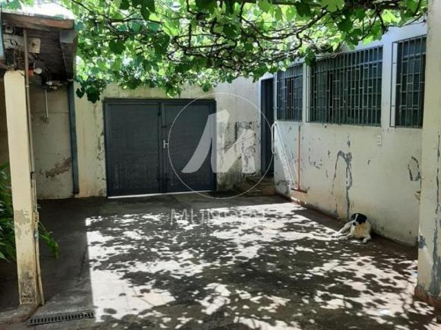 Casa térrea na rua 4 dormitórios, cozinha planejada