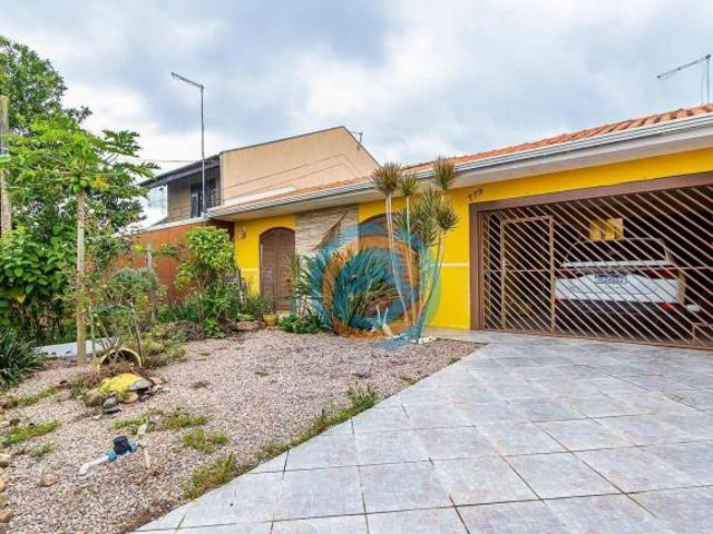 Casa Térrea no Xaxim Curitiba: 3 Quartos, Reformada e Amplo Terreno