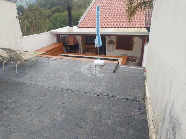 Casa Térrea no bairro Tarumã com Piscina, Área Gourmet e 2 Quartos
