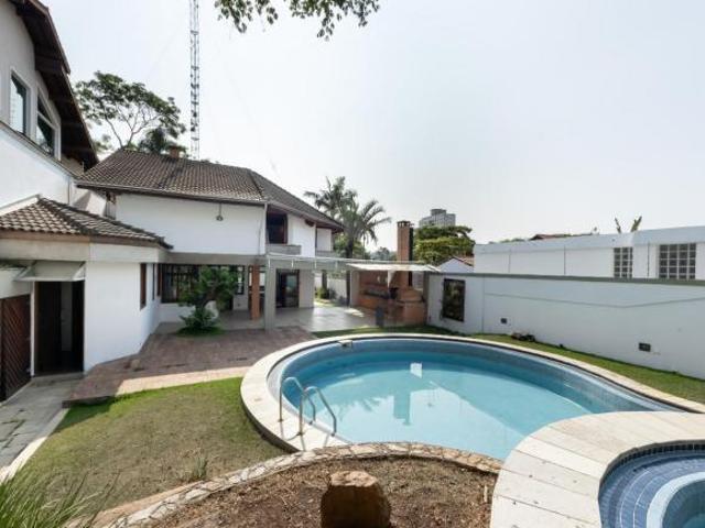 Casa tipo para venda com 4 quartos, 409m²