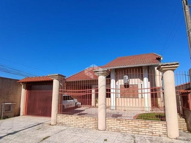 Casa três dormitórios à venda em Canoas