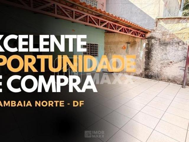 Casa um sobrado com 02 casas no lote com garagem para 3 carros