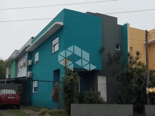 Casa à Venda no Bairro Tomazzetti em Santa Maria com 3 quartos