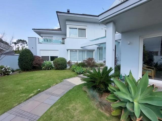 Casa à Venda com 4 dormitórios, sendo 1 suíte master, 4 vagas, sala de cinema Caxias do Sul / RS