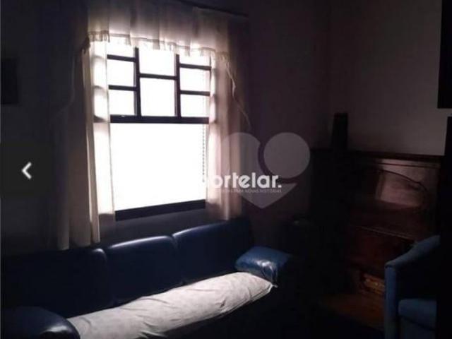 Casa Vila Madalena rua tranquila.