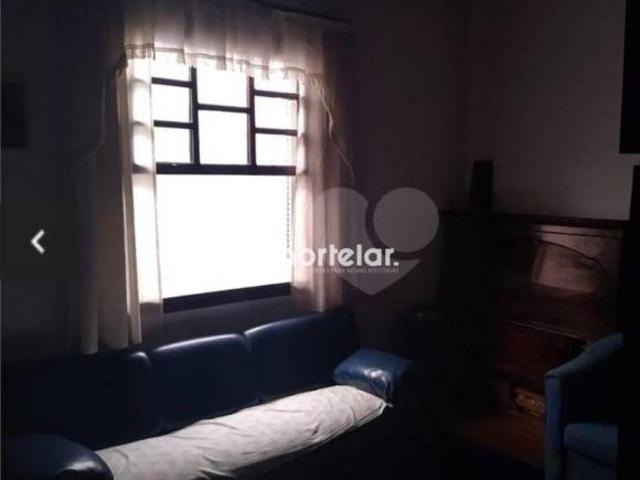 Casa Vila Madalena rua tranquila.
