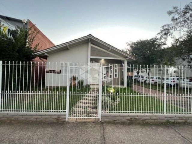 Casa 04 dormitórios próximo a UNISC com espaço para escritório