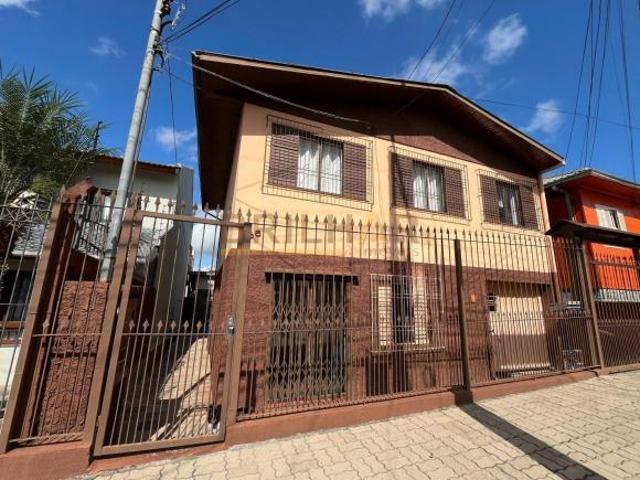 Casa 02 dormitórios comprar bairro Sagrada Familia