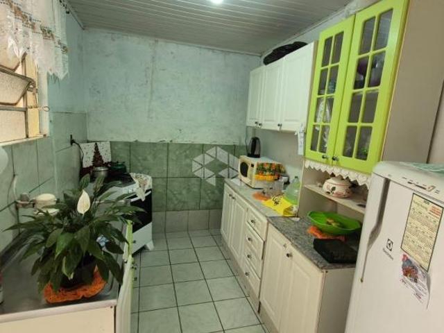 CASA 02 DORMITÓRIOS E 03 VAGAS BAIRRO MORRO SANTANA