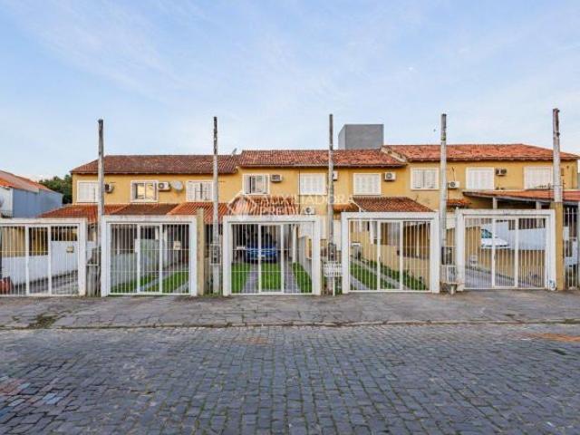 Casa 02 dormitórios vaga para 2 carros, bairro Jardim Leopoldina, Porto Alegre