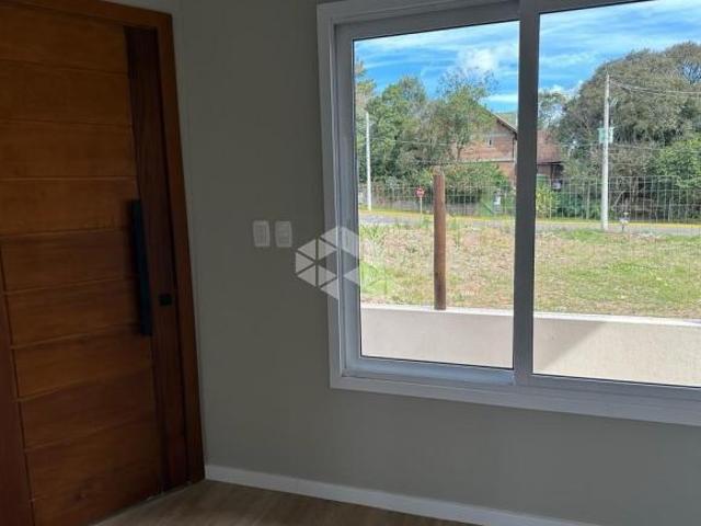 Casa 02: 102,29 m2 de área construída + 9,25 m2 de jardim privativo