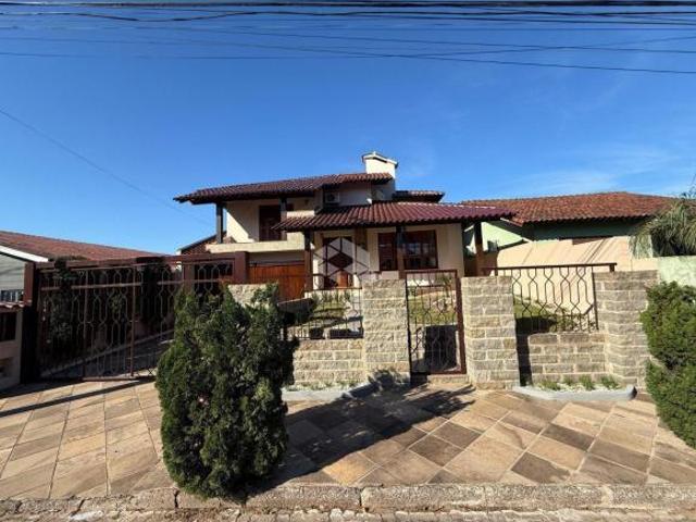 Casa 03 dormitórios e piscina, logo após UNISC