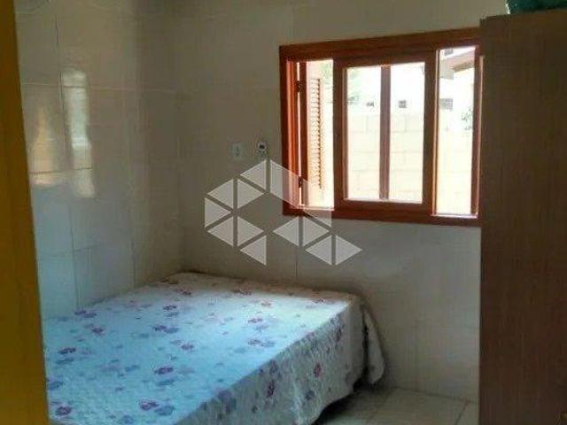 Casa 03 dormitórios. Tarumã Viamão RS