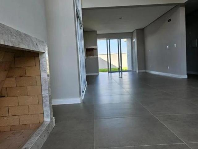 Casa 178m² a venda por R$1.440.000,00. 3 três dormitórios sendo 1 uma suíte Nova Santa Rita/RS