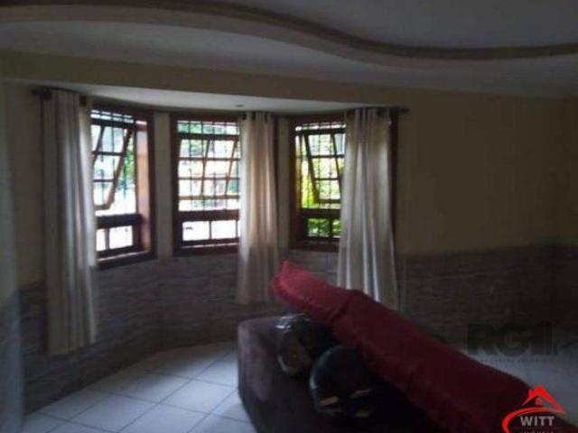 Casa 179m², 3 dormitórios, 3 vagas no bairro Parque Santa Fé