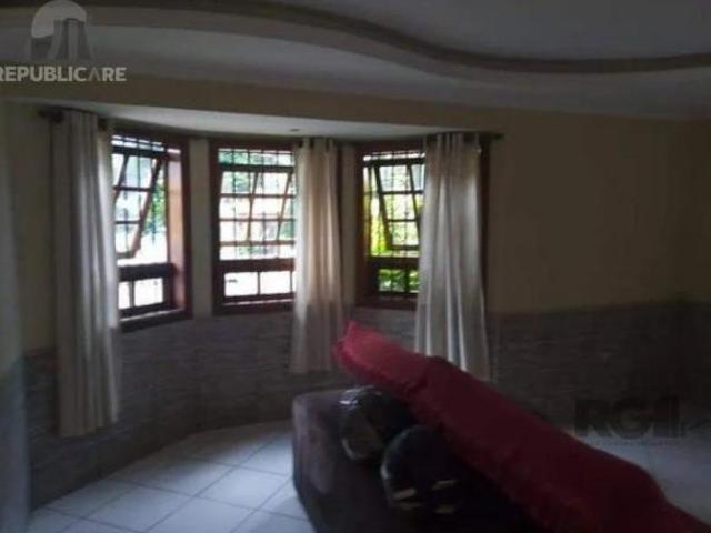 Casa 179m², 3 dormitórios, 3 vagas no bairro Parque Santa Fé