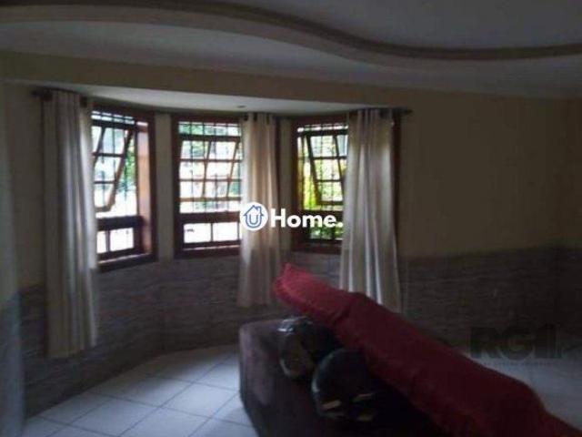 Casa 179m², 3 dormitórios, 3 vagas no bairro Parque Santa Fé