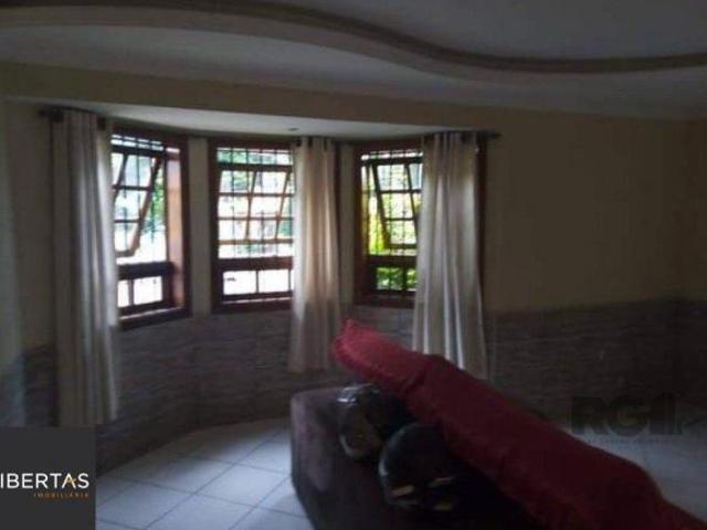 Casa 179m², 3 dormitórios, 3 vagas no bairro Parque Santa Fé