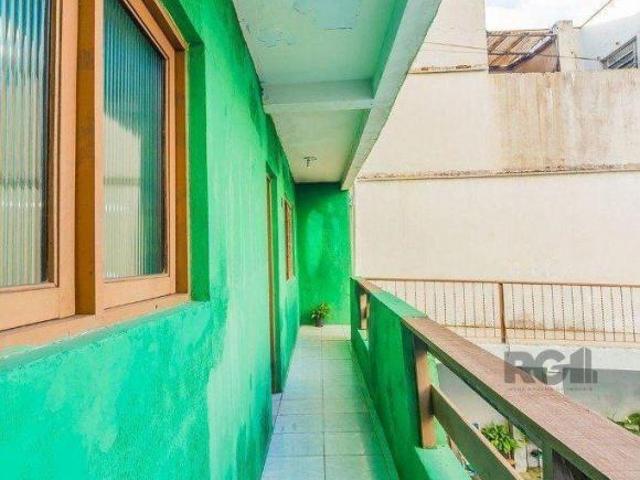 Casa 242m² 5 dormitórios, 6 vagas no bairro Cristo Redentor