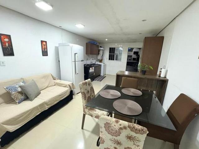 Casa 2 dorm, sala, cozinha, banheiro e área gourmet. Aceita carro no negócio