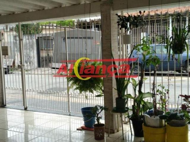 CASA 2 DORMITÓRIO COM SUITE E DUAS VAGAS, 7M DE FRENTE