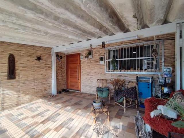 Casa 2 dormitórios 1 suíte com quintal e 2 vagas – Caiçara, Praia Grande/SP