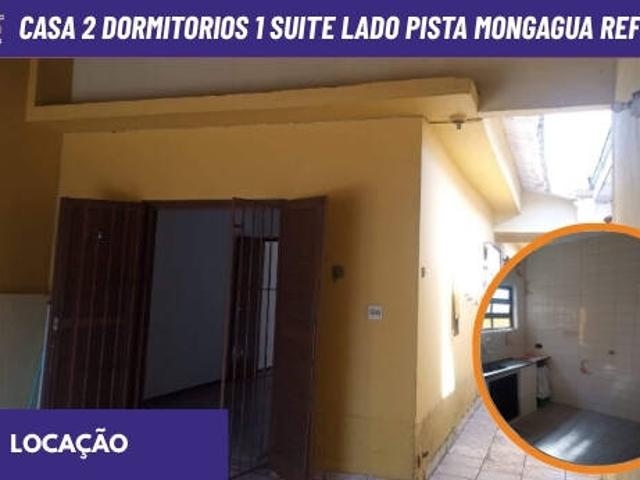 CASA 2 DORMITORIOS 1 SUITE LADO PISTA LOCACAO MONGAGUA