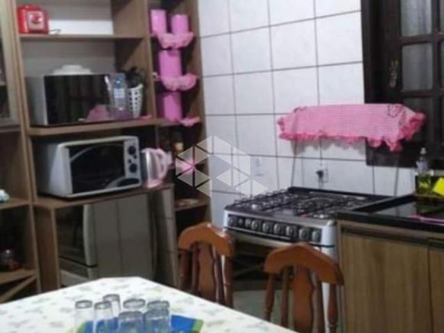 CASA 2 DORMITORIOS,2 BANHEIROS,2 VAGAS COBERTAS BAIRRO HIPICA