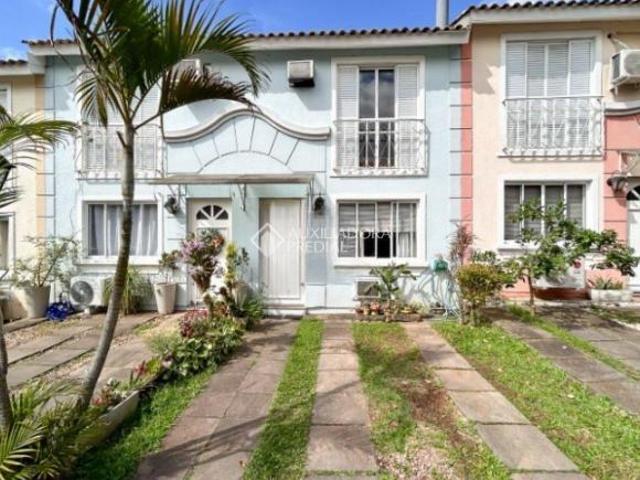 Casa 2 dormitórios 79m2 privativos 1 vaga de garagem no bairro Cavalhada