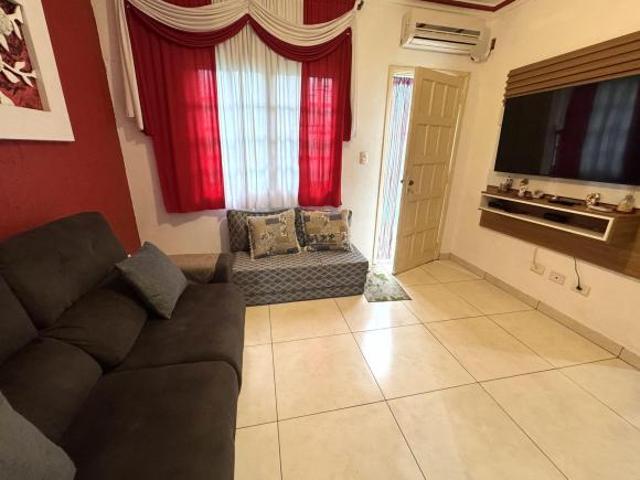 Casa 2 dormitórios com 1 suite em Condomínio no bairro Caiçara, em Praia Grande