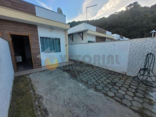 Casa 2 dormitórios à venda, 70 m² por R$ 390.000 Massaguaçu Caraguatatuba/SP