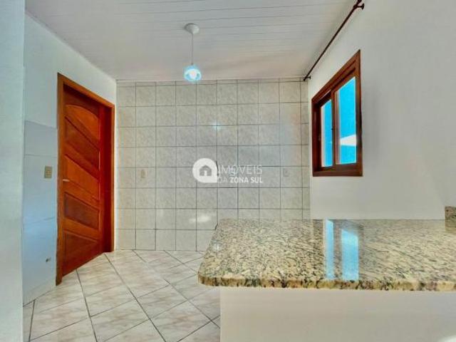 Casa 2 Dormitórios à venda no bairro Hípica Porto Alegre/RS, Zona Sul