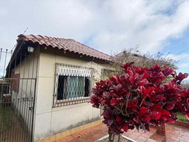 CASA 2 DORMITÓRIOS E GARAGEM NO PARTENON: CONFORTO, ESPAÇO E LOCALIZAÇÃO ESTRATÉGICA