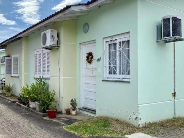 CASA 2 DORMITÓRIOS EM CONDOMINIO FECHADO