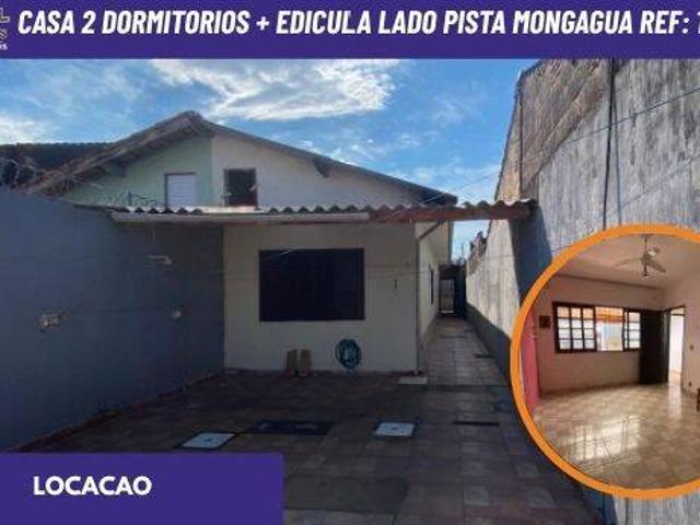 CASA 2 DORMITORIOS + EDICULA LADO PISTA LOCACAO MONGAGUA