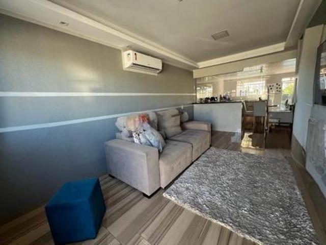 Casa 2 dormitórios no bairro Santa Rita/ Guaiba, com terreno de 10X30