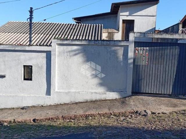CASA 2 DORMITÓRIOS SENDO1 SUITE COM GARAGEM NO BAIRRO JARDIM CARVALHO