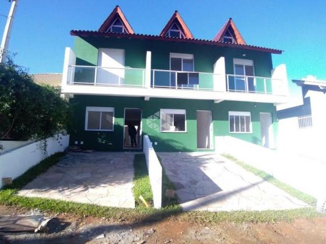 Casa 2 dormitórios, sendo 1 suíte, no Bairro Guarujá