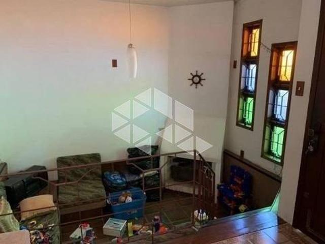 Casa 2 dormitórios para venda no bairro Medianeira em Porto Alegre