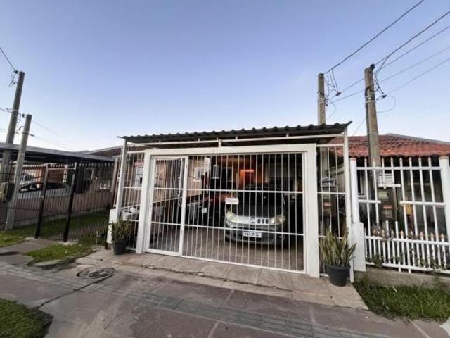 Casa 2 Dormitórios Winter Park 1 vaga de garagem