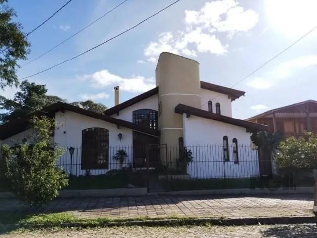 Casa 303m² 4 dormitórios, 2 vagas no bairro Santo Antônio