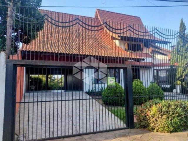 Casa 3 dormitórios, 3 suítes, 6 vagas, Bairro Igara, Canoas