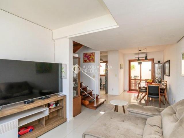 casa 3 dormitórios 1 suíte com sacada com vista para Guaíba