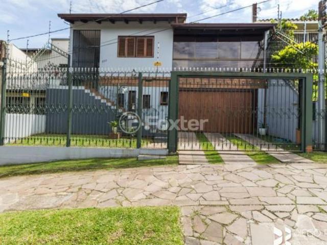 Casa, 3 dormitórios, 292.8 m², em Cavalhada
