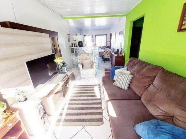 Casa / 3 Dormitórios / 2 Vagas / Churrasqueira e Piscina / Porto Verde / Jardim